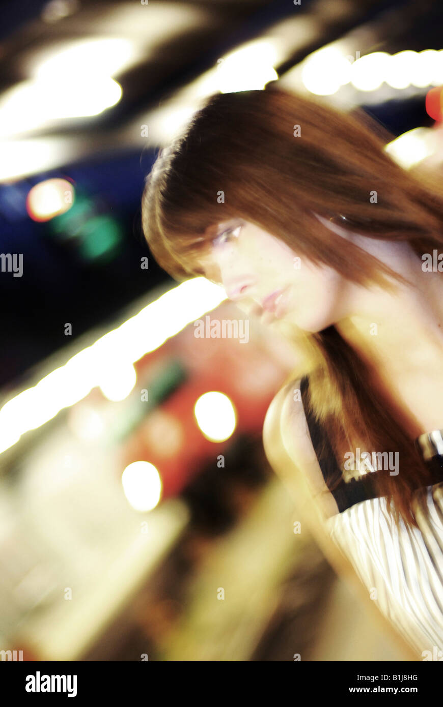 young woman posing on a platform Stock Photo - Alamy