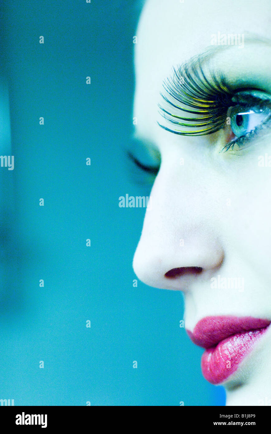 heavily rouged, young blond woman with violet lips Stock Photo - Alamy