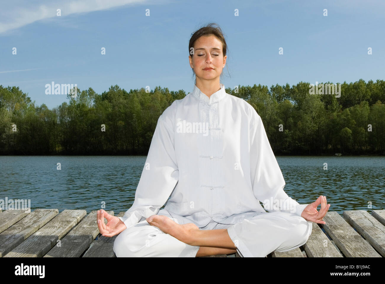 Yoga, half lotus pose, Ardha Padmasana, Mudra Stock Photo - Alamy