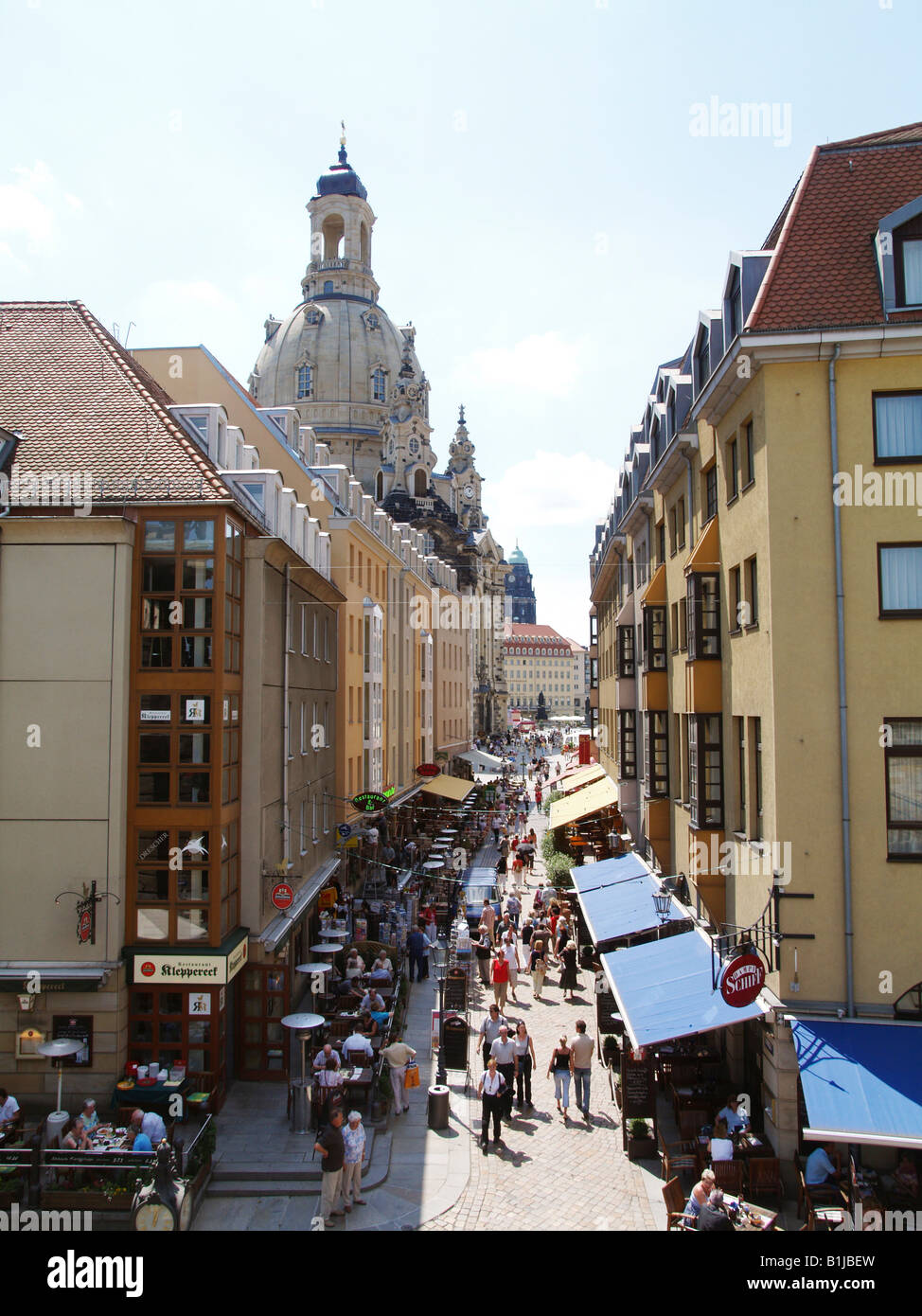 view through a pedestrian zone in the old town of Dresden to the church ...