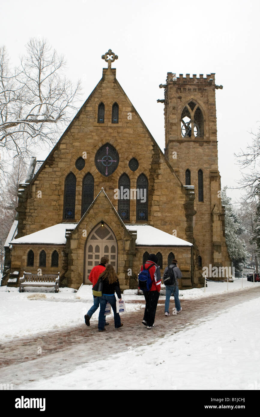 Student walk past the University Chapel on the Grounds of the ...