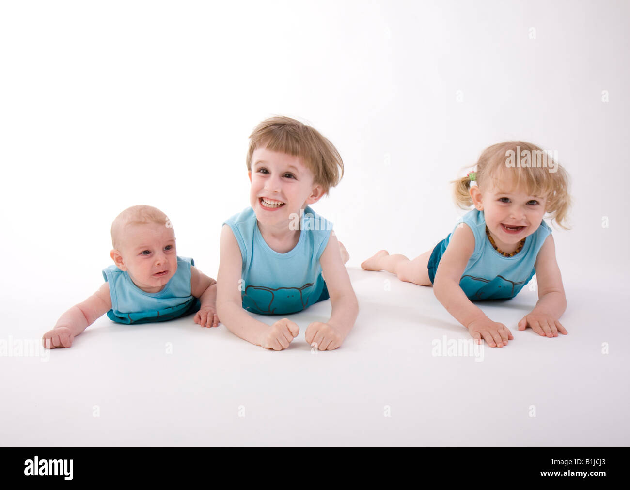 three little children Stock Photo - Alamy