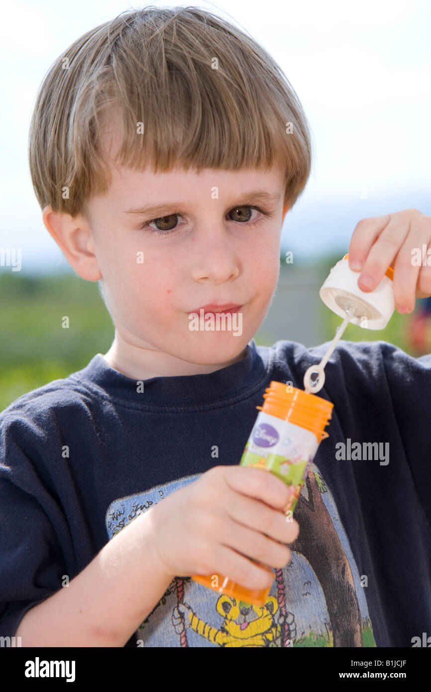 little boy making soap bubble Stock Photo - Alamy