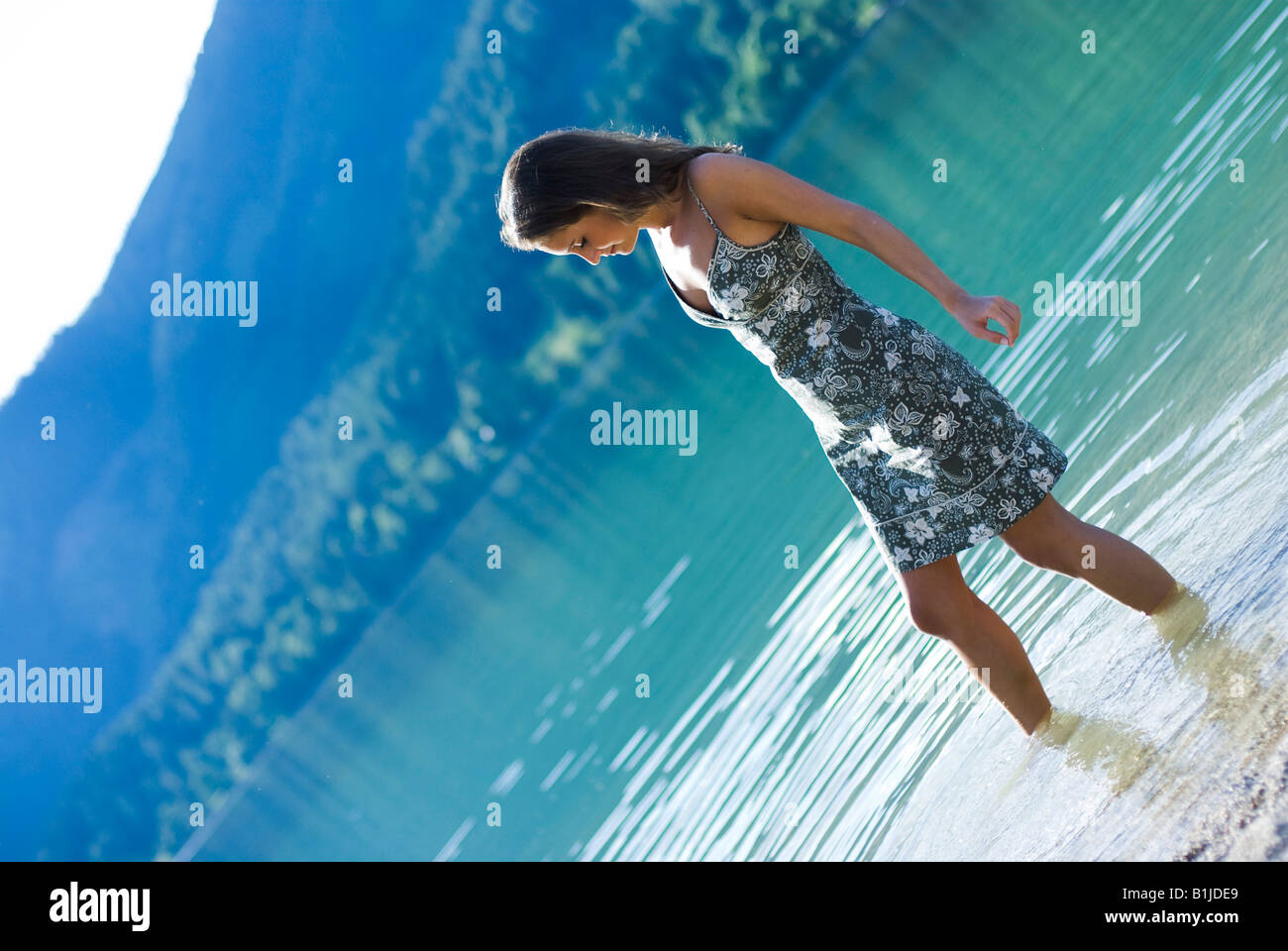 Woman wading lake dress hi-res stock photography and images - Alamy