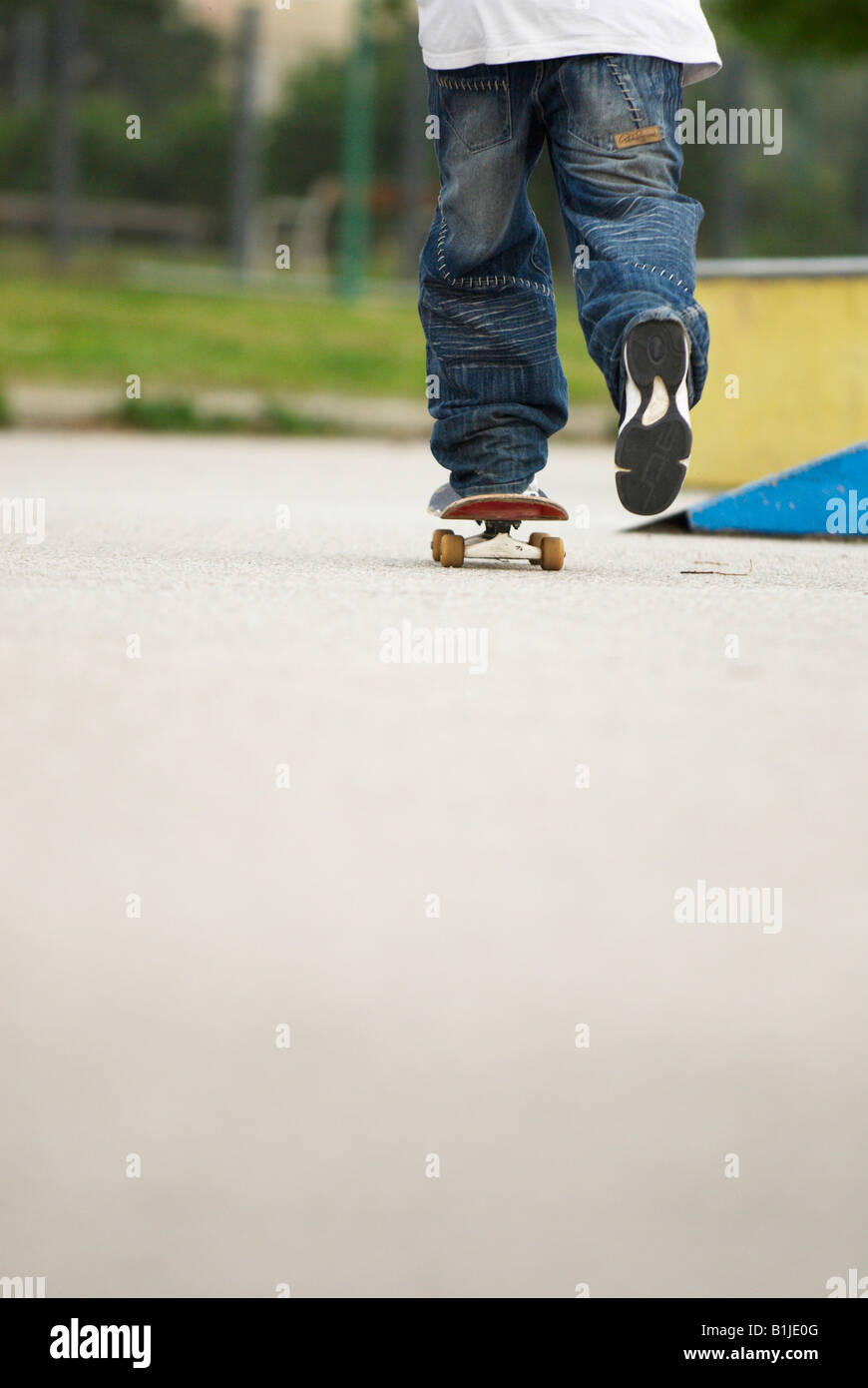 back view of a skater on a skateboard Stock Photo - Alamy