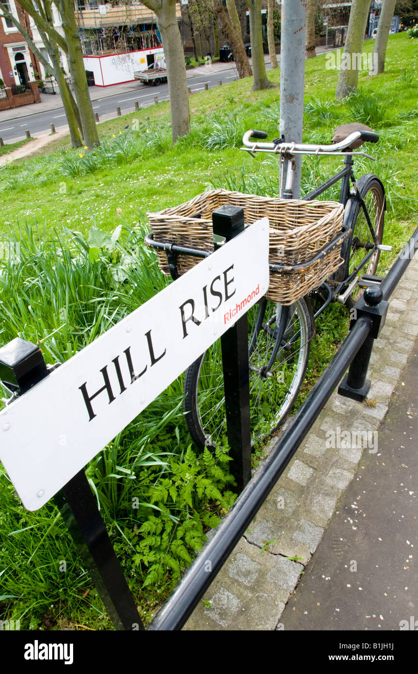 'Hill Rise' road sign and an old bicycle parked next to it, Richmond ...