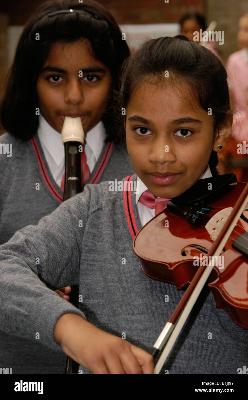 children learning music Stock Photo - Alamy