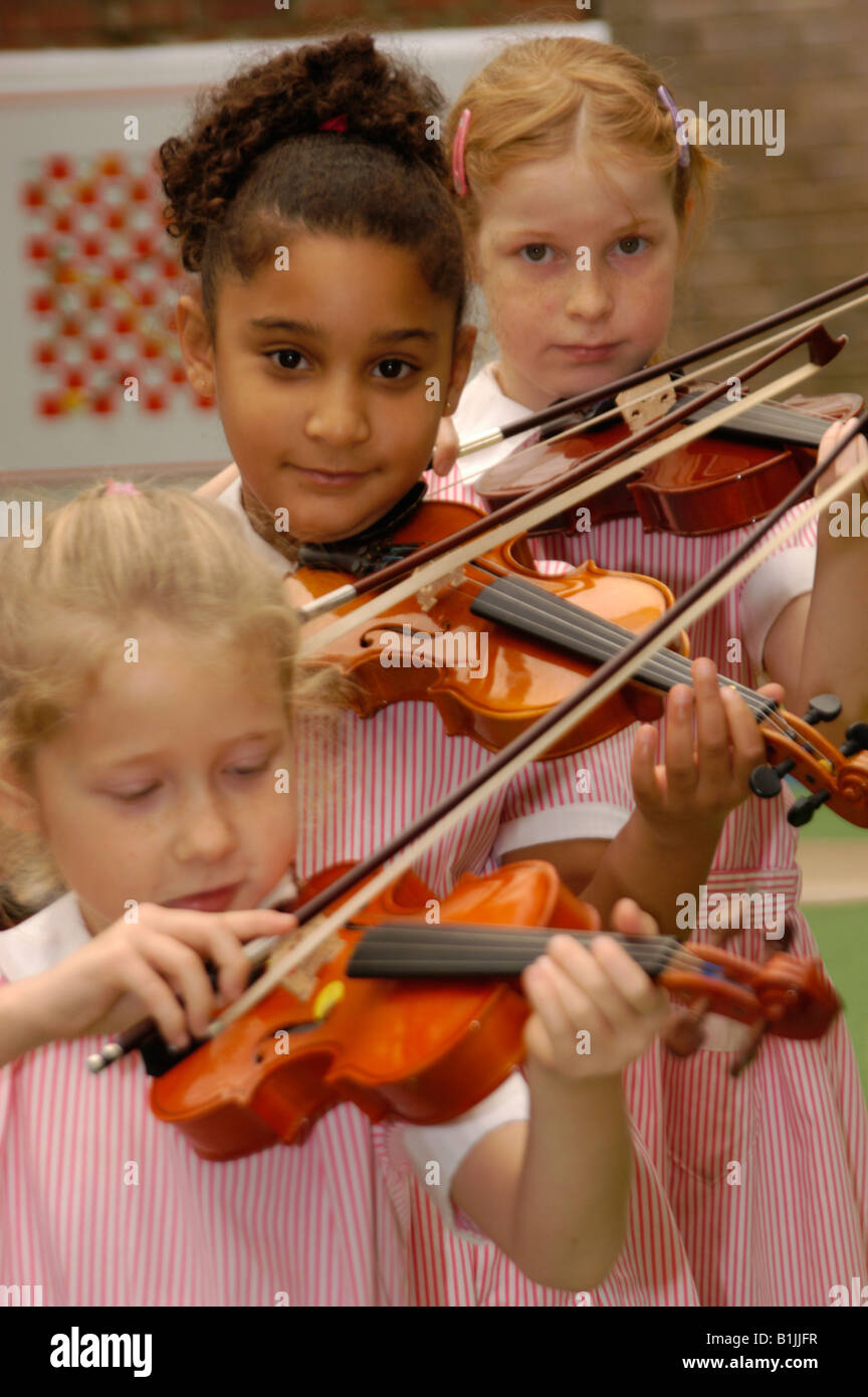 children learning music Stock Photo - Alamy