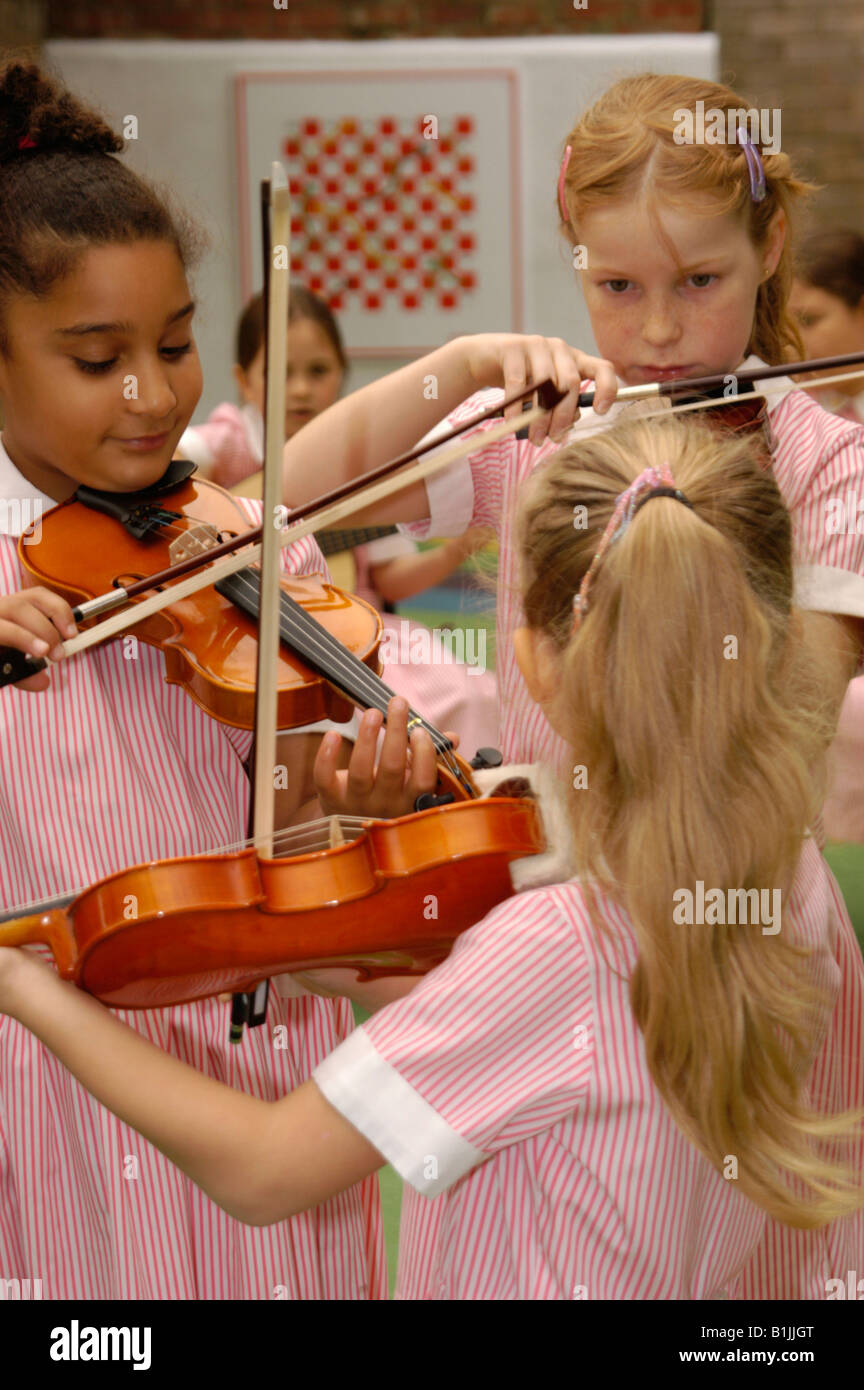 children learning music Stock Photo - Alamy