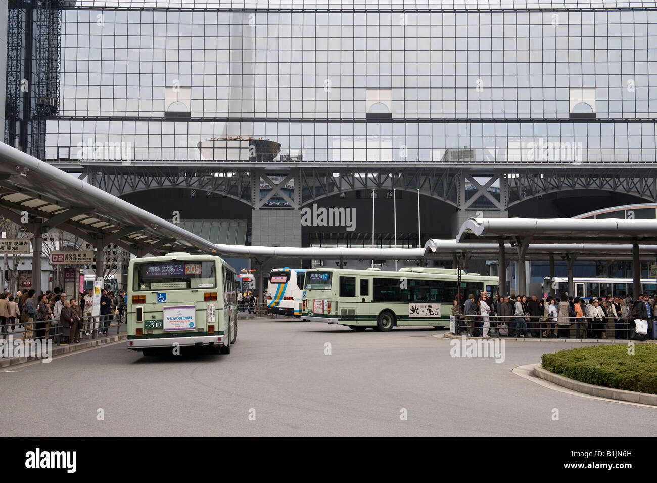 Kyoto, Japan. The busy central bus station, outside the main railway ...
