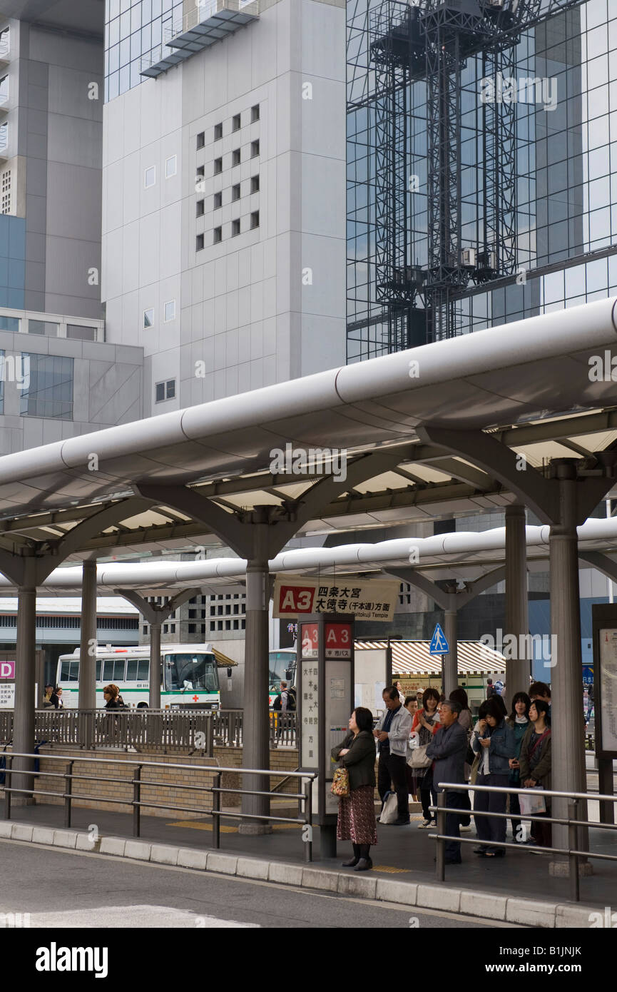Kyoto, Japan. The busy central bus station, outside the main railway ...