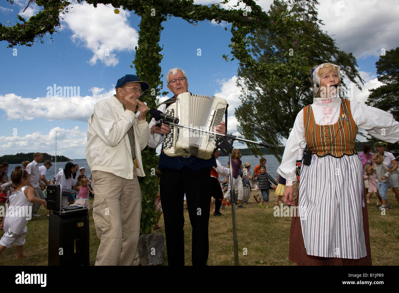 Dancing round the Maypole at Midsummer (Sweden Stock Photo - Alamy