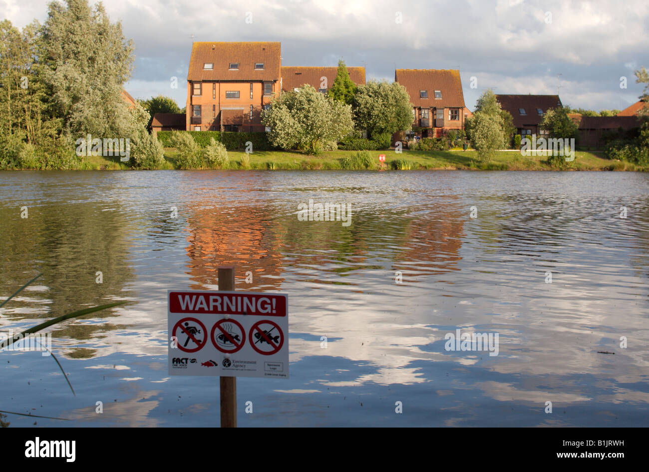 England Surrey Woking Goldsworth Park lake warning sign Stock Photo - Alamy