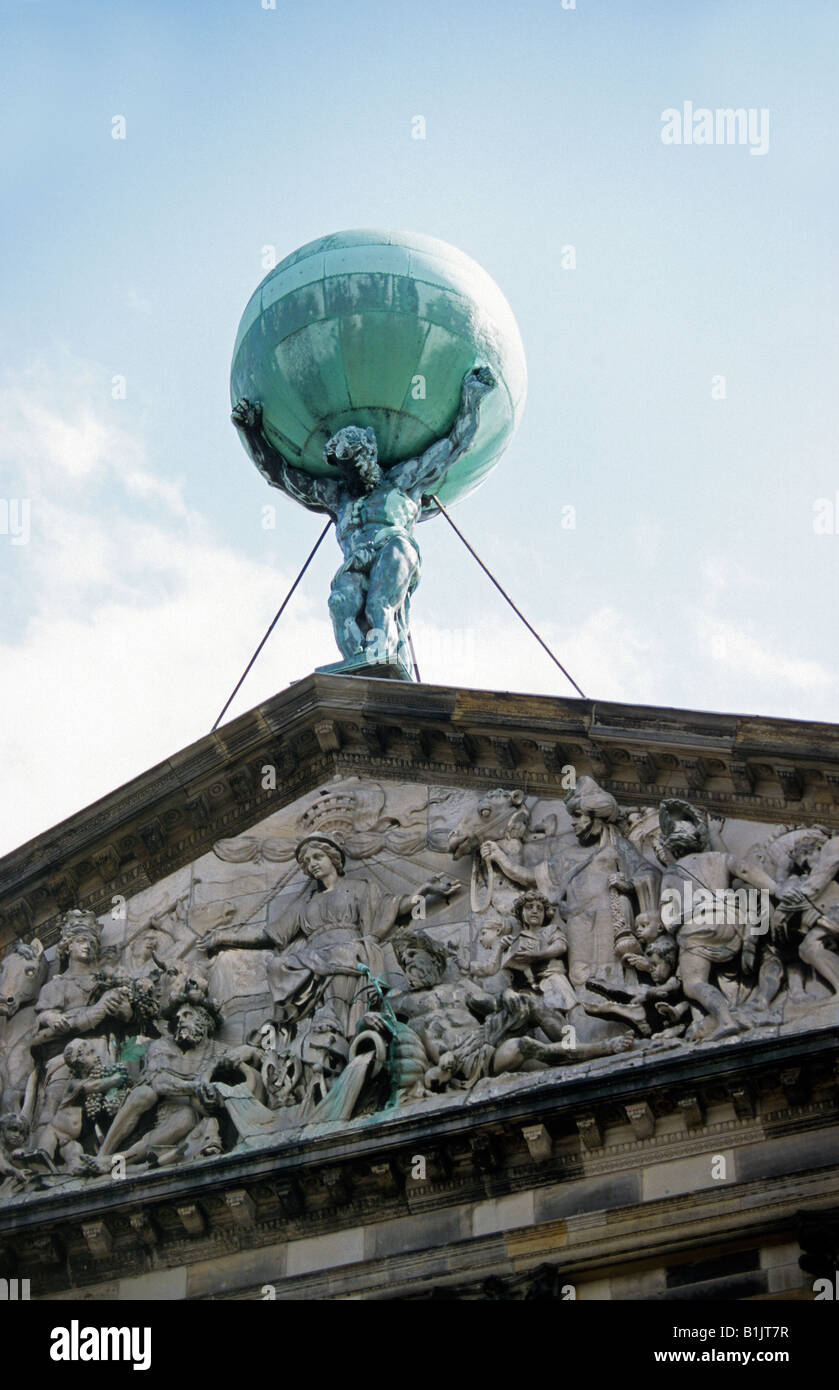 europe holland amsterdam the statue of atlas on top of the koninklijk ...