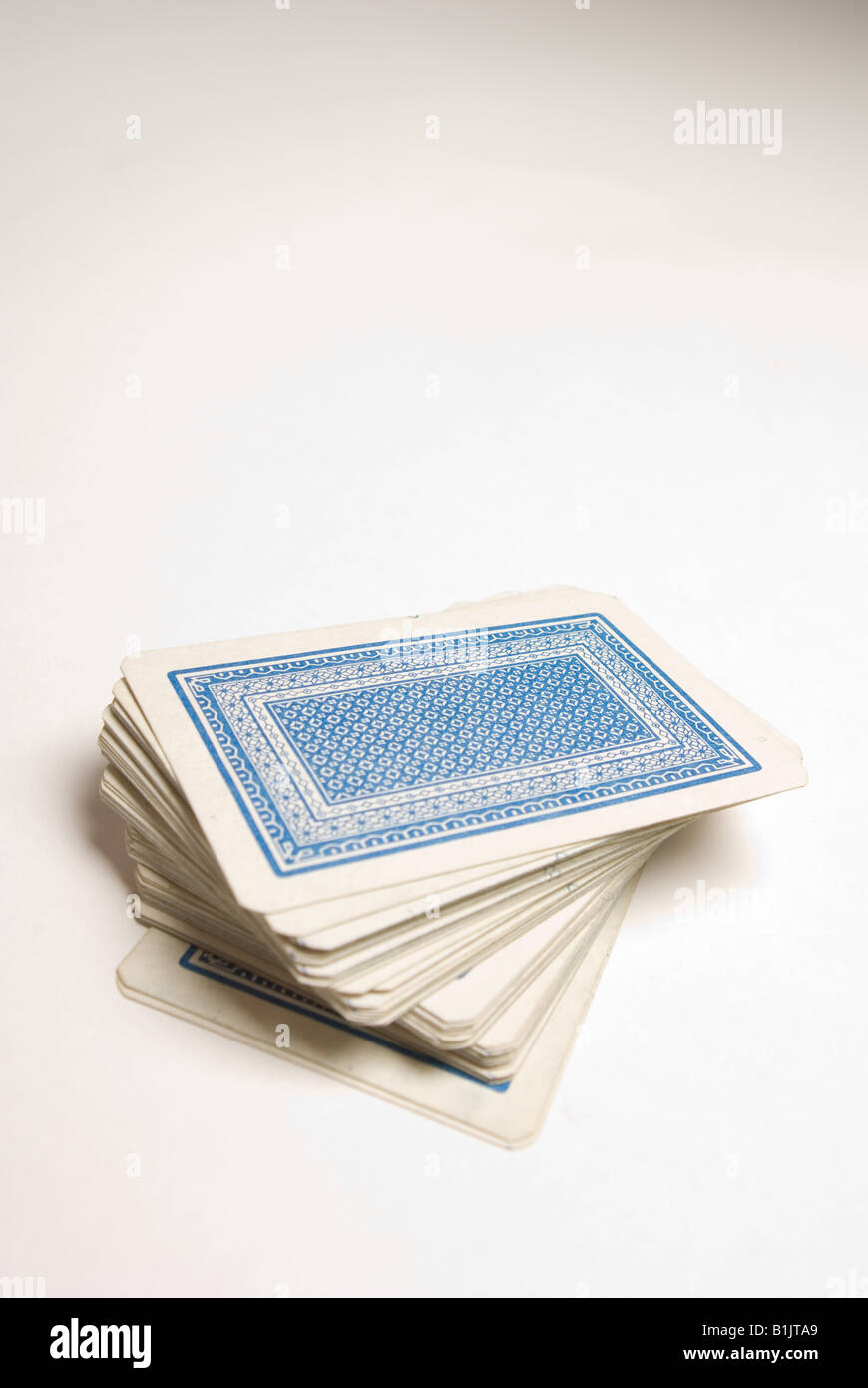 stack of cards on white background Stock Photo - Alamy