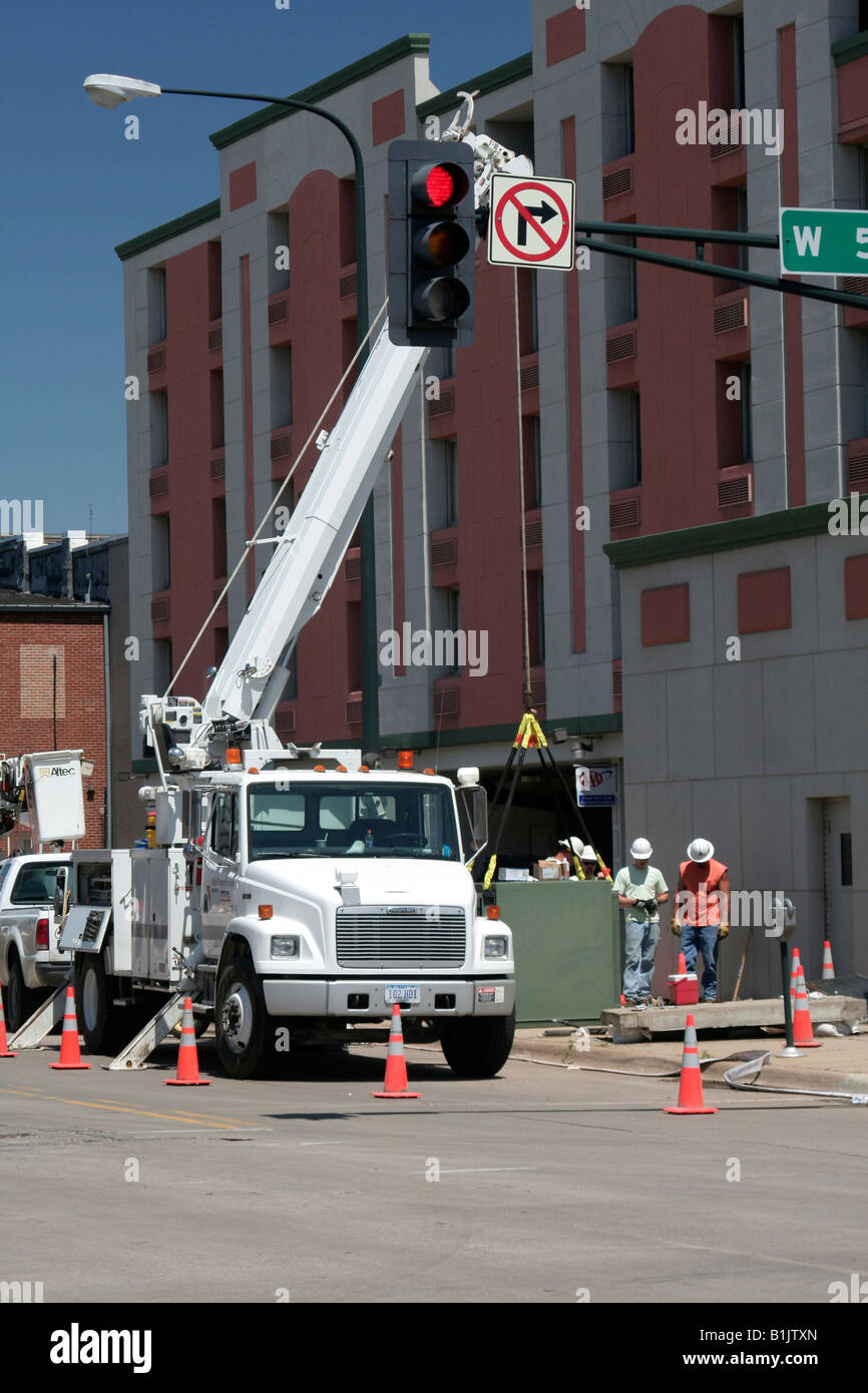 Electrical crews replace underground transformers after flooding Stock ...