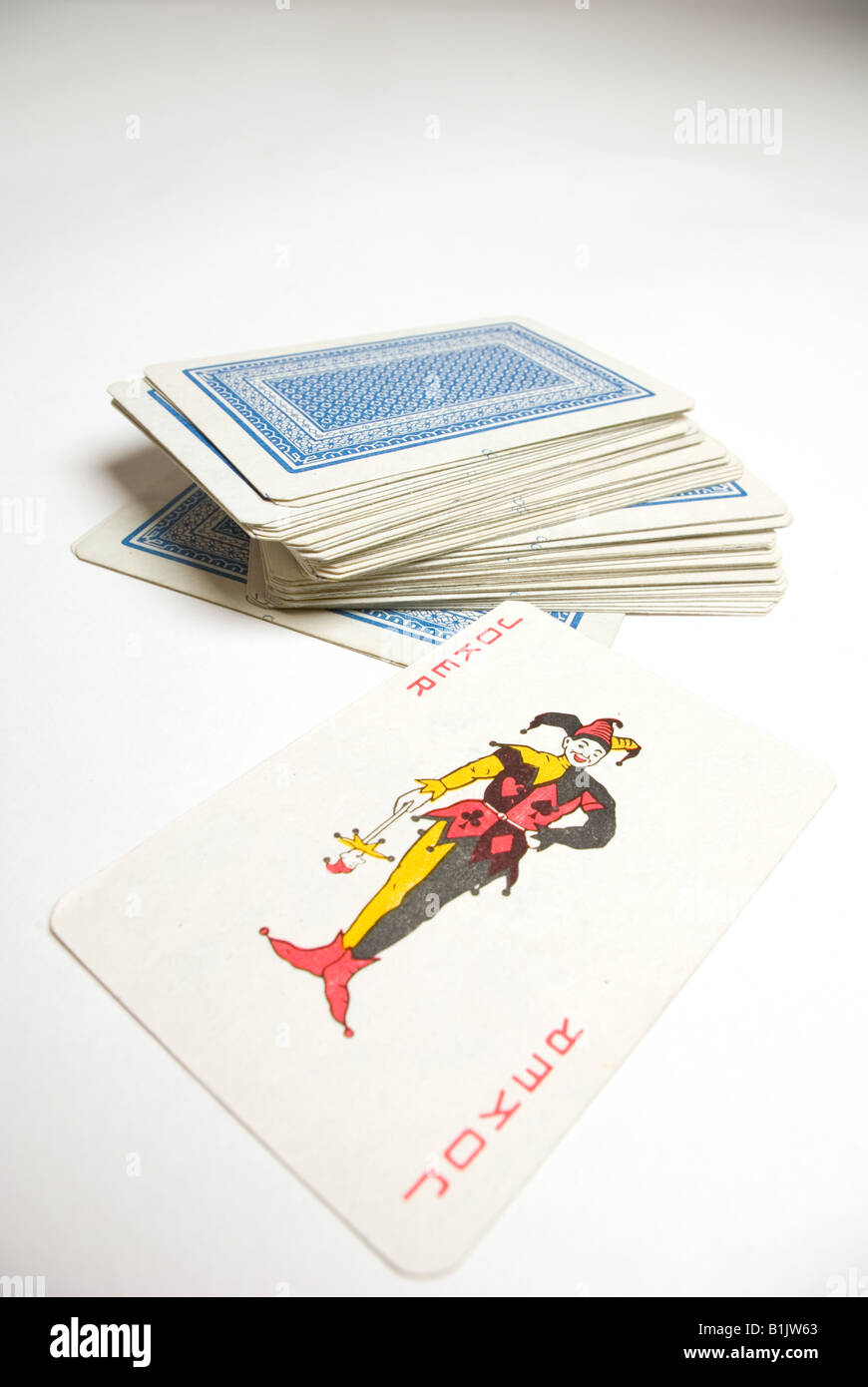 Pack of cards and Joker Stock Photo - Alamy
