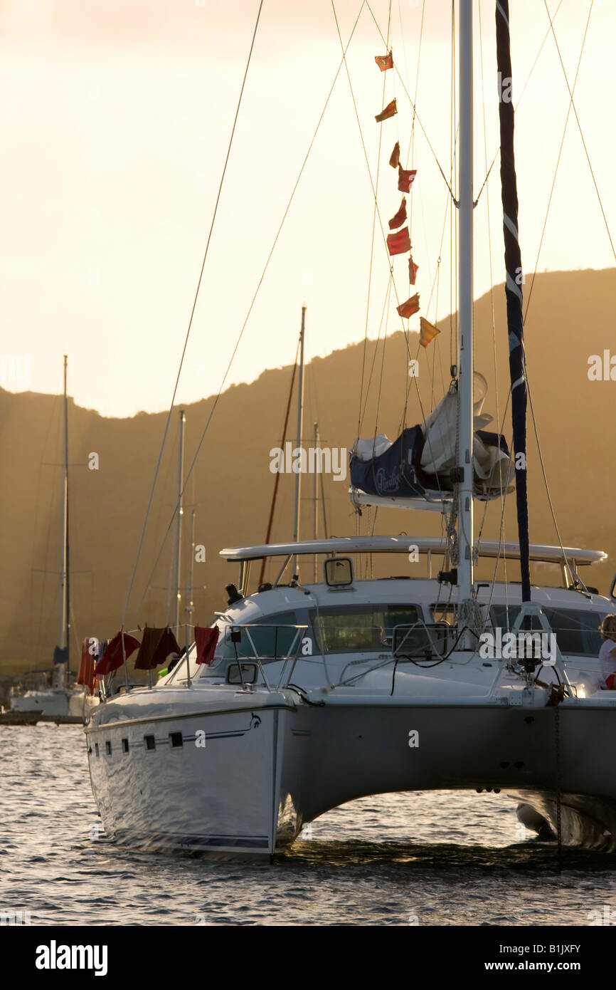 catamaran on mooring with laundry on the rail Stock Photo - Alamy
