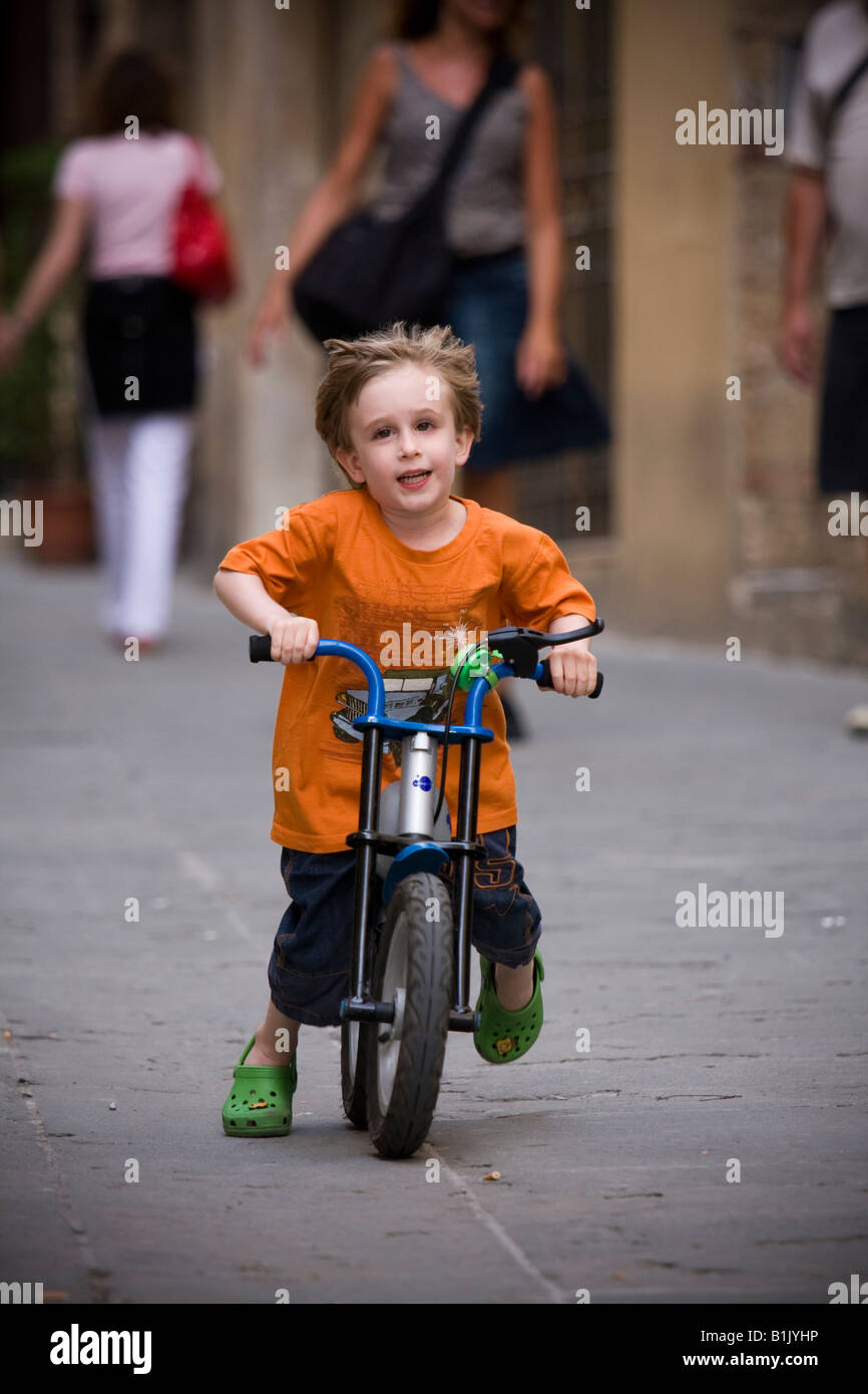 little boy on the wheel Stock Photo - Alamy