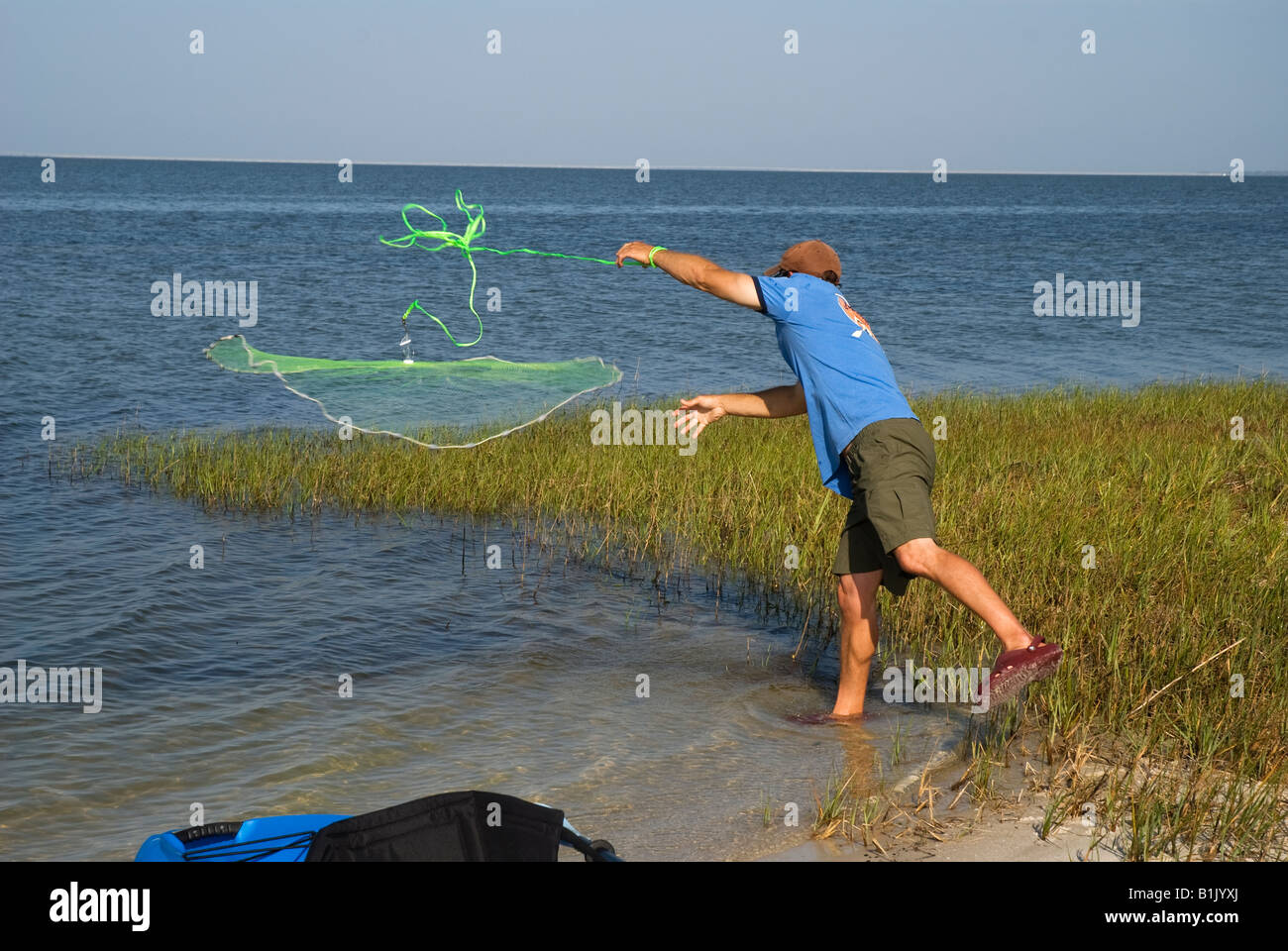 casting a net for fish, North Florida Stock Photo - Alamy