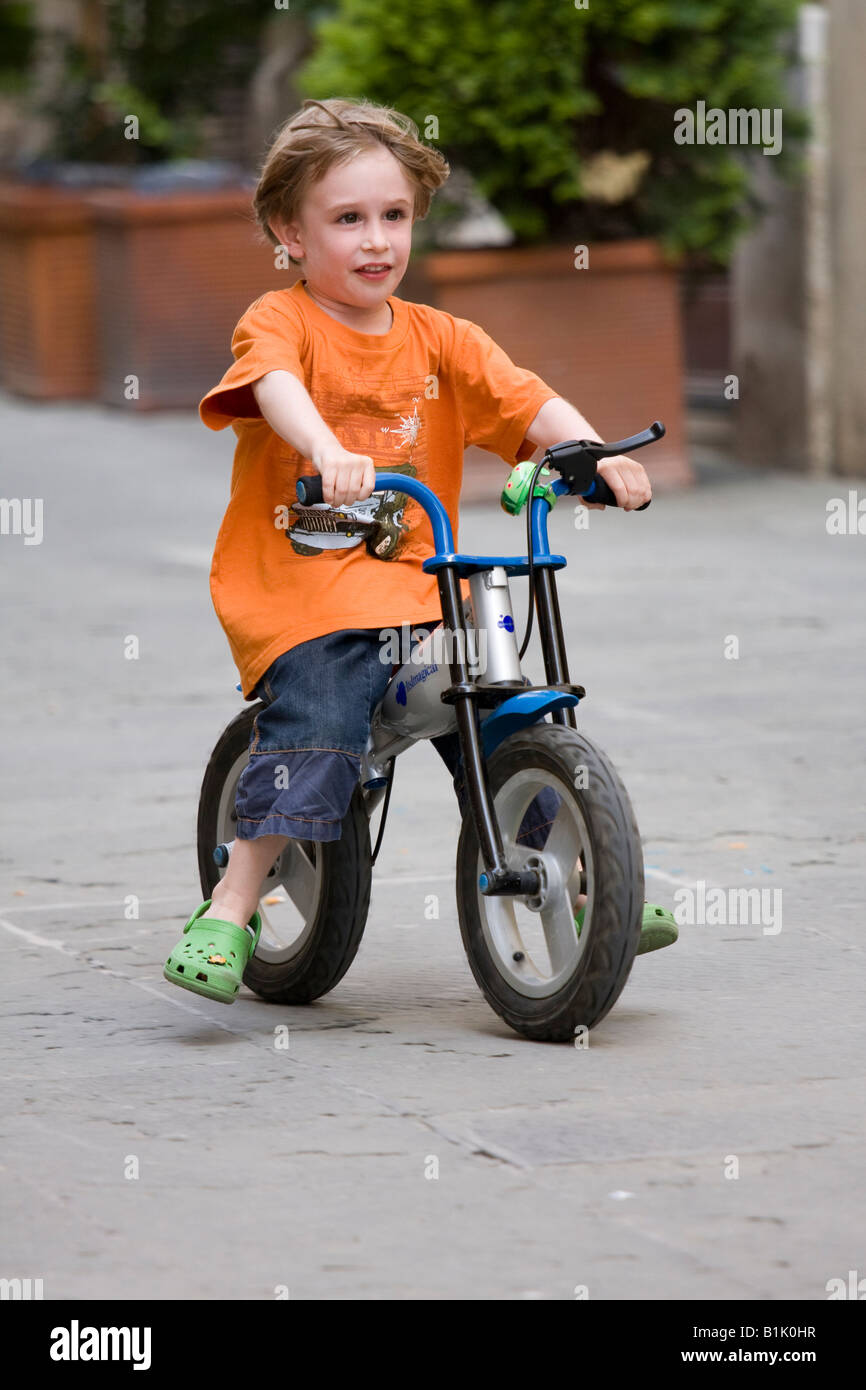 little boy on the wheel Stock Photo - Alamy