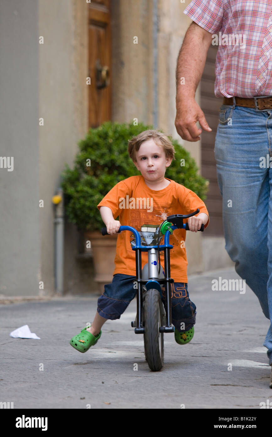little boy on the wheel Stock Photo - Alamy