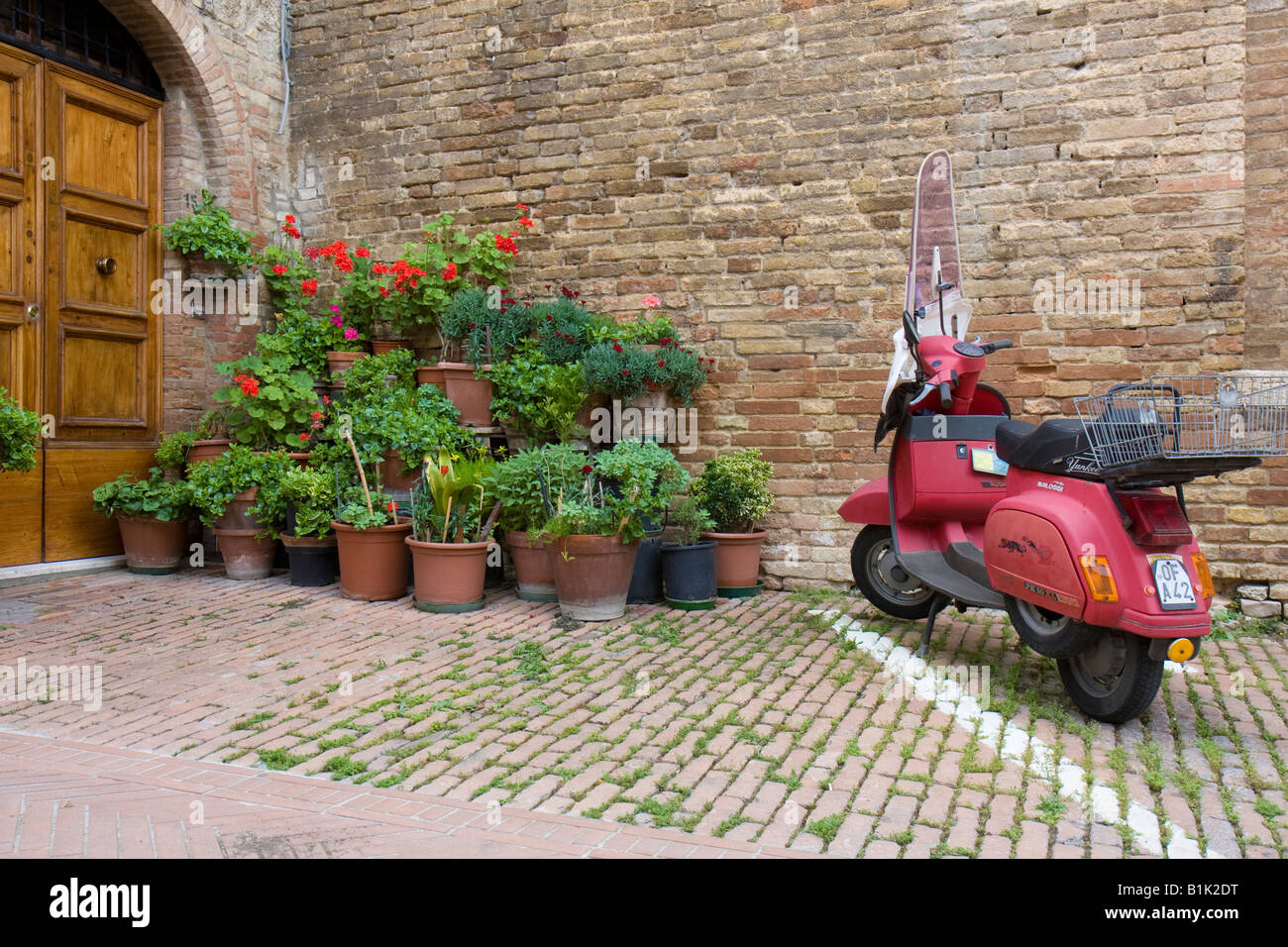 moped in front of house Stock Photo - Alamy