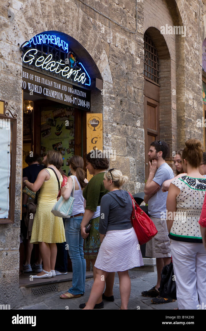 queue in front of ice cream shop Stock Photo - Alamy
