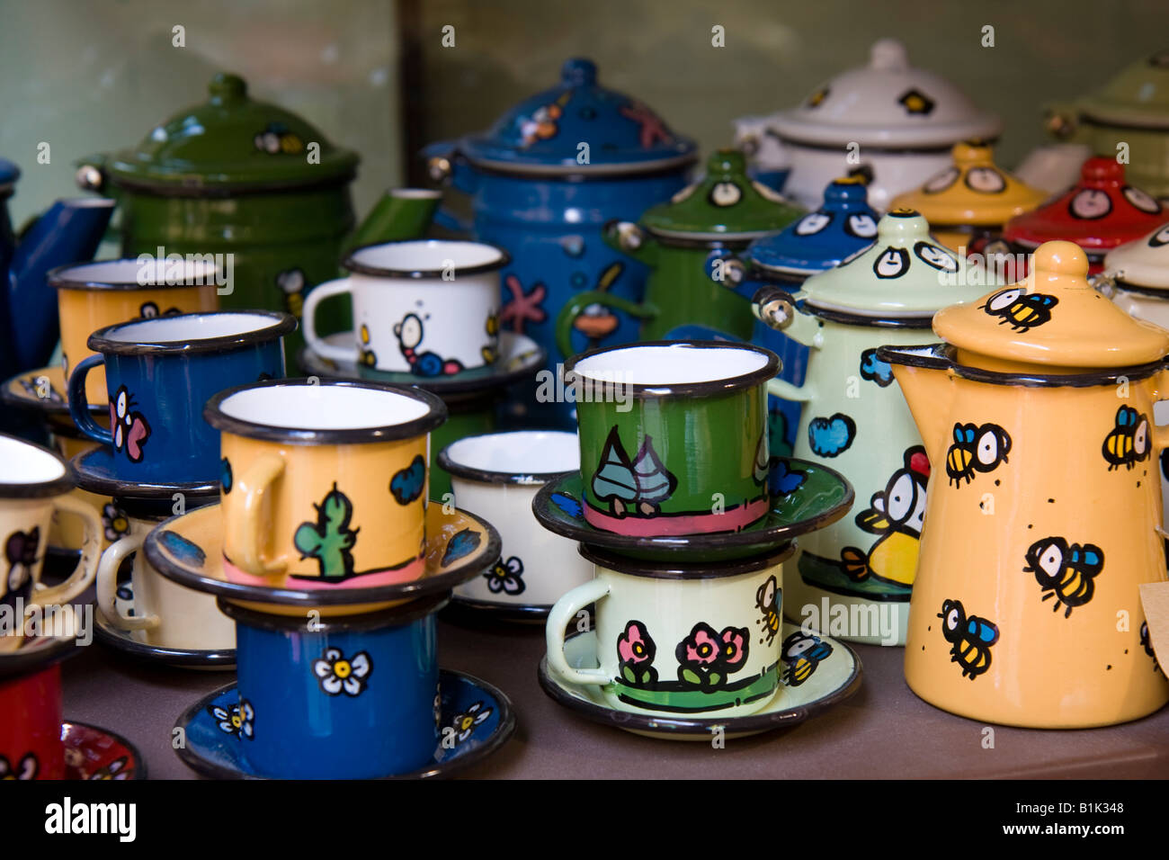 colorful tinware cups Stock Photo - Alamy