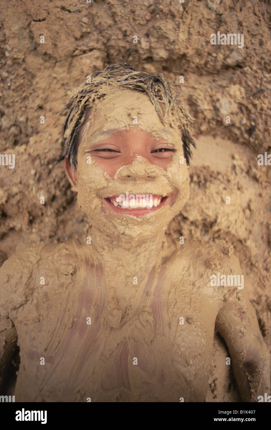 Muddy child playing hi-res stock photography and images - Alamy
