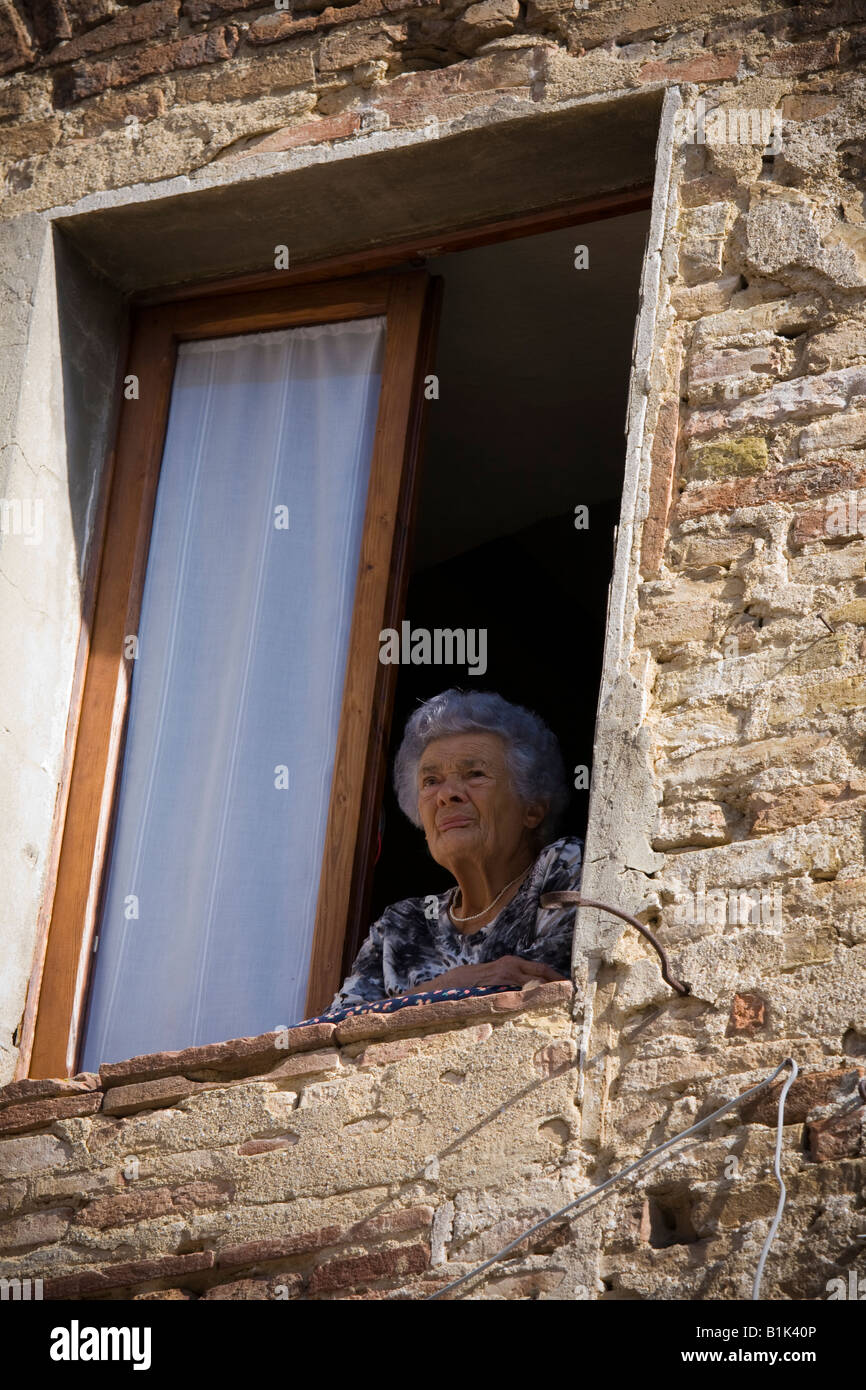 old woman looking out from window Stock Photo - Alamy