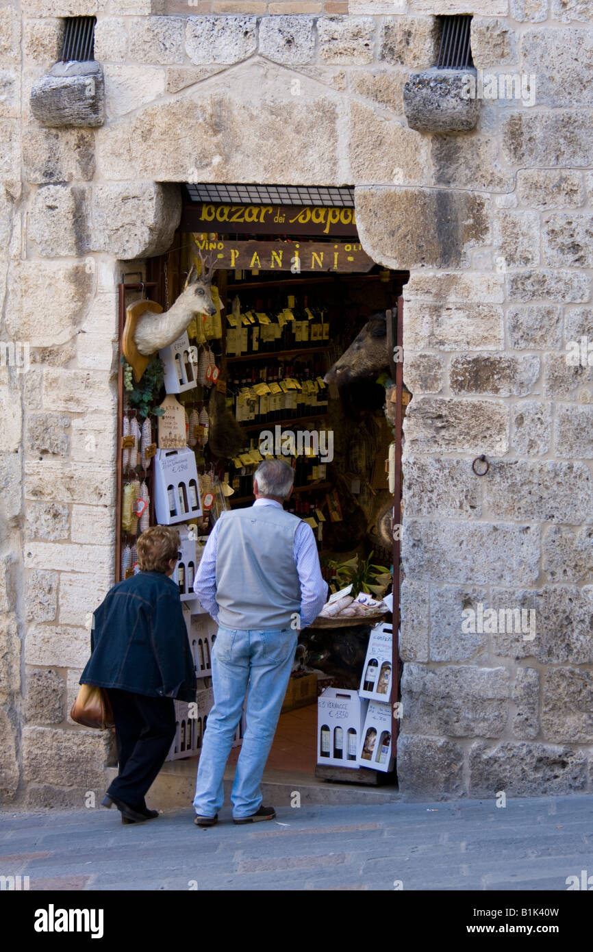 people looking into a shop Stock Photo - Alamy