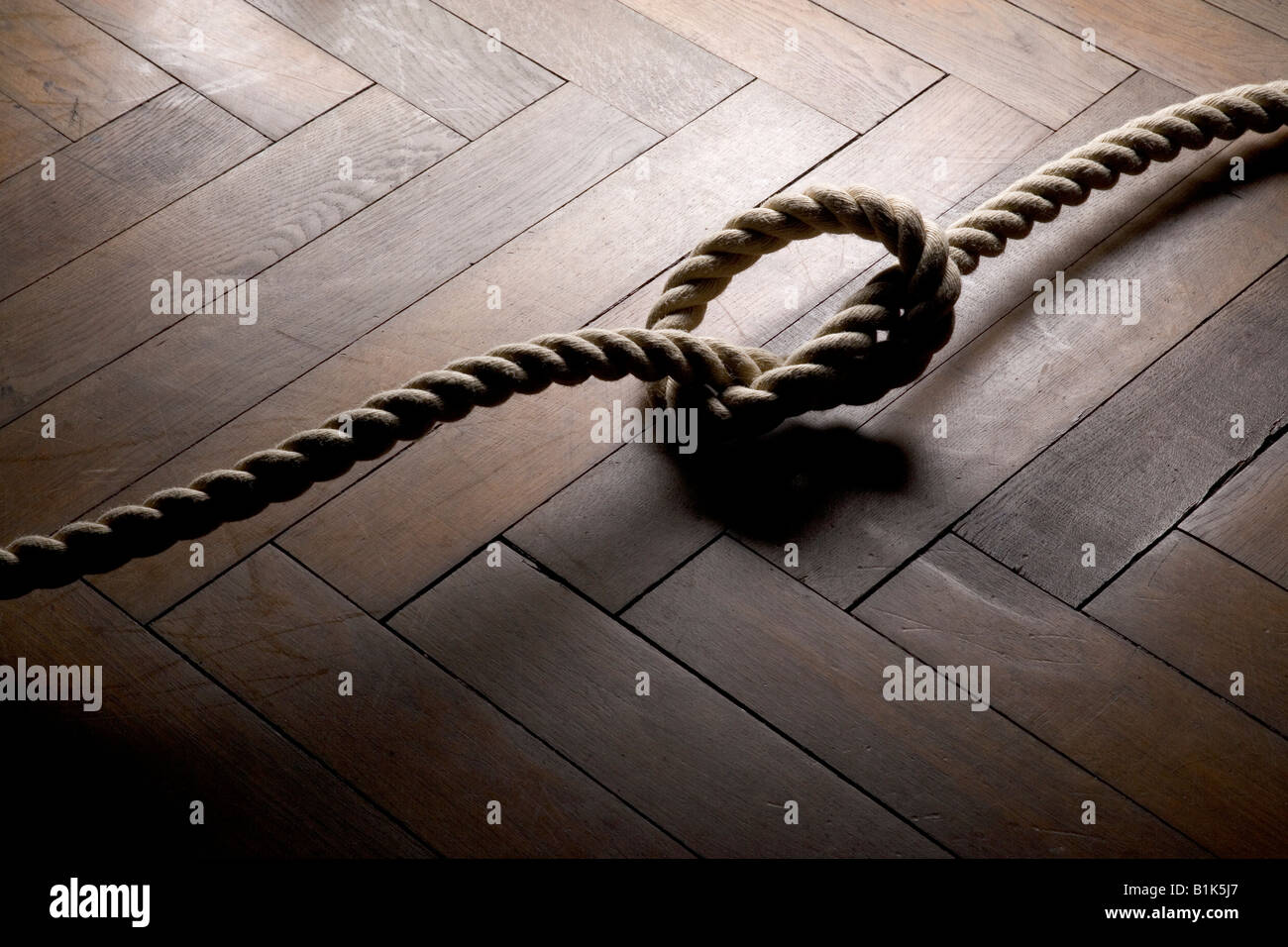 Rope on the floor Stock Photo - Alamy