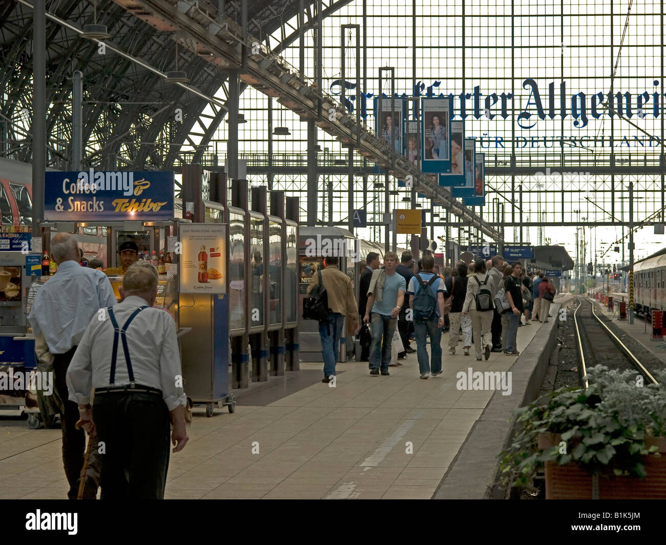 busy passangers with luggage baggage hurrying to train platform at the ...