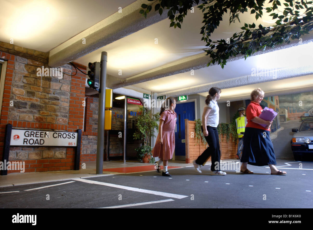 JUNIOR SCHOOL CHILDREN ARE INSTRUCTED IN SAFE ROAD CROSSING IN A ...