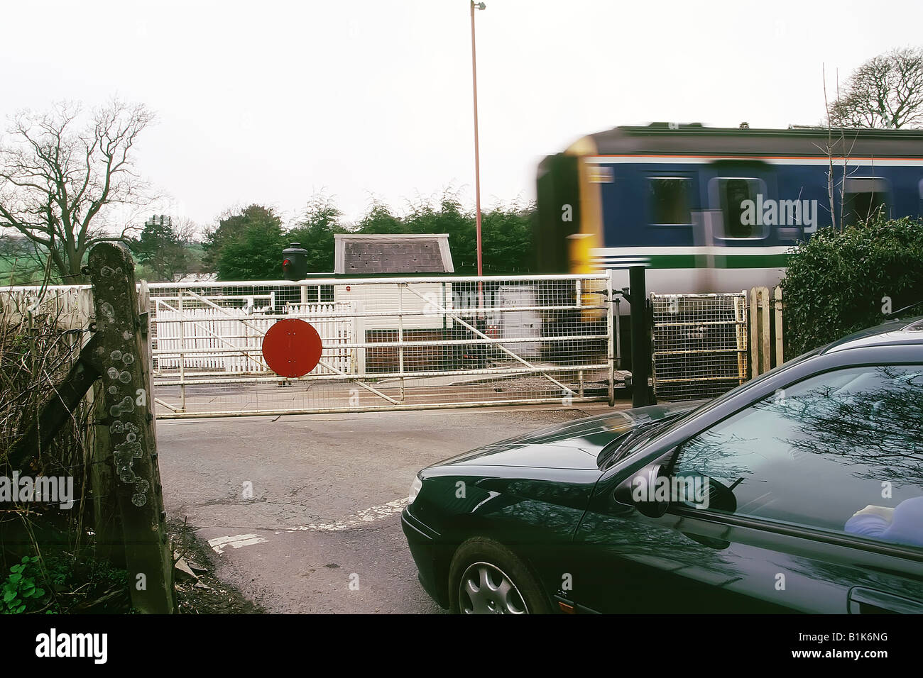Old fashioned railway crossing gates hi-res stock photography and ...