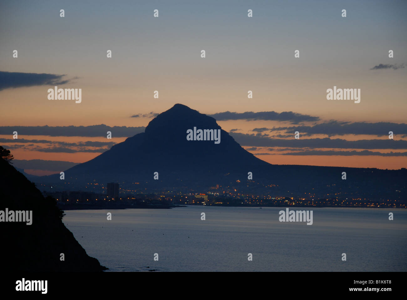 view to Montgo and Arenal area from Cabo San Martin at sunset, Javea ...