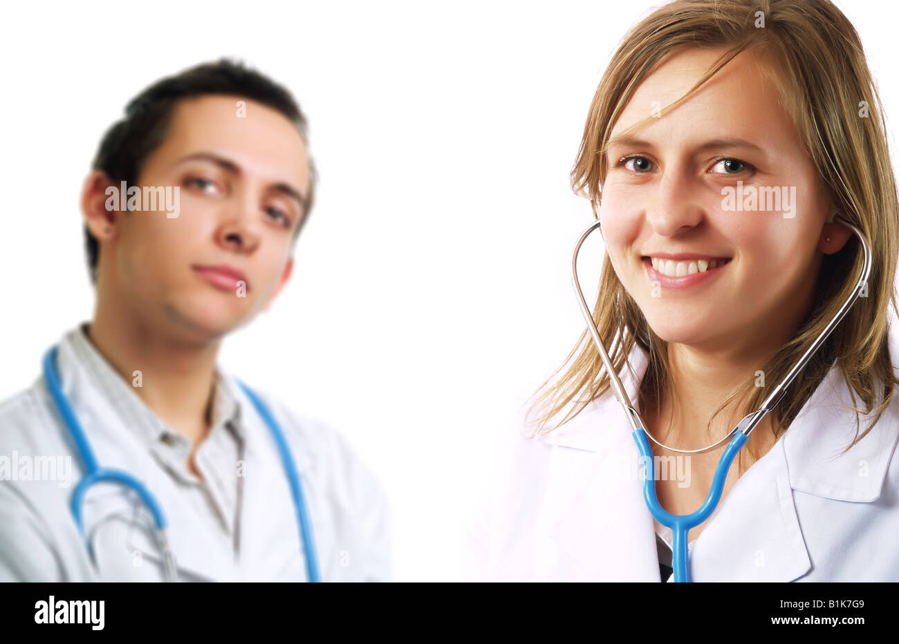 Lady doctor and assistant Stock Photo - Alamy