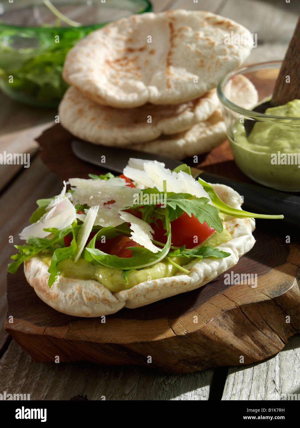 Pitta bread with pesto mayonnaise rocket and Parmesan shavings ...