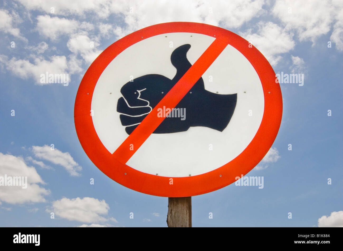 Roadside sign warning of no hitchhiking Stock Photo - Alamy