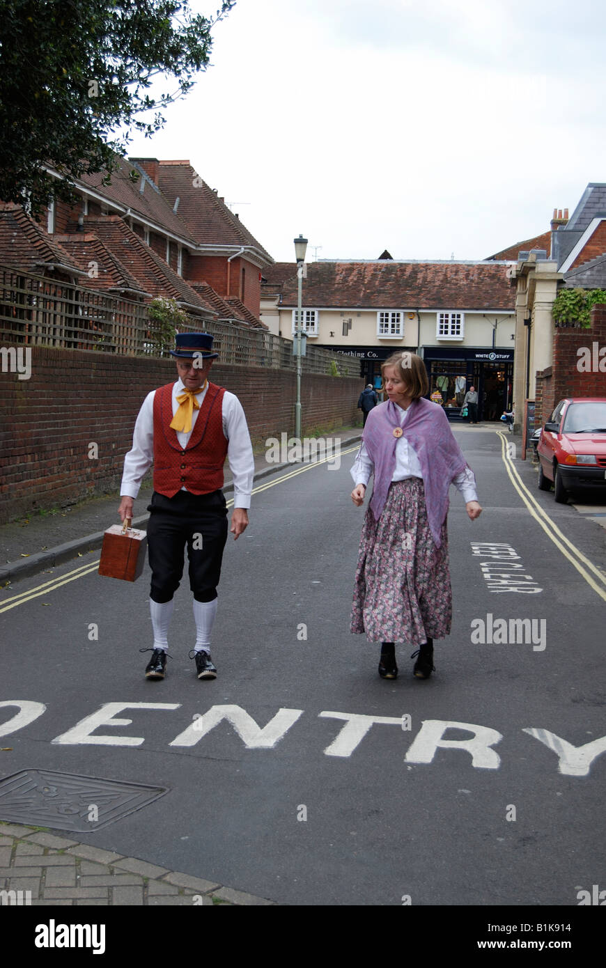 Traditional English dancers practicing a dance routine in a quiet side ...