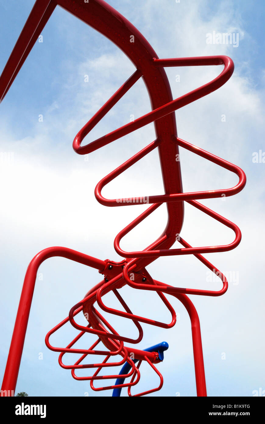 Curved set of monkey bars at a playground Stock Photo - Alamy