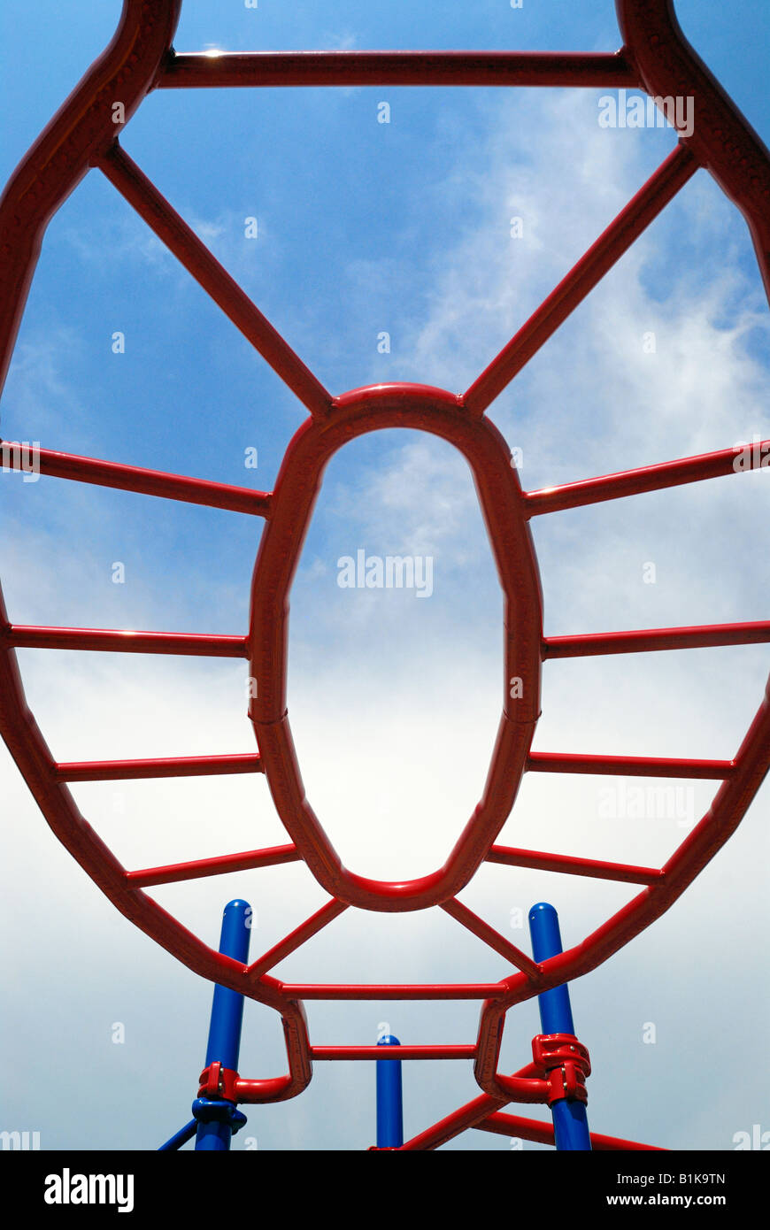 Curved set of monkey bars at a playground Stock Photo - Alamy