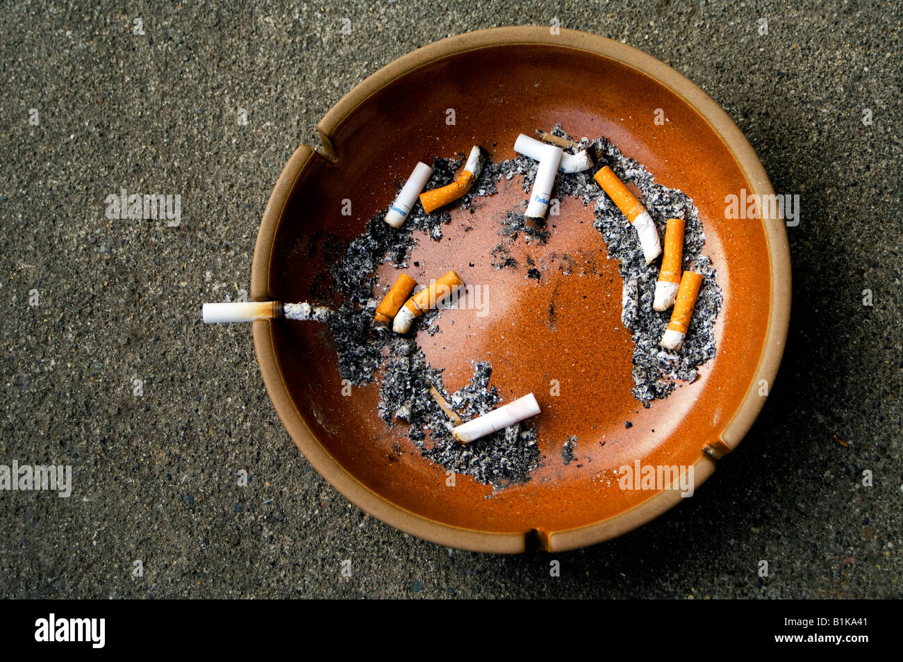 Burning cigarette smoking ashtray hi-res stock photography and images ...