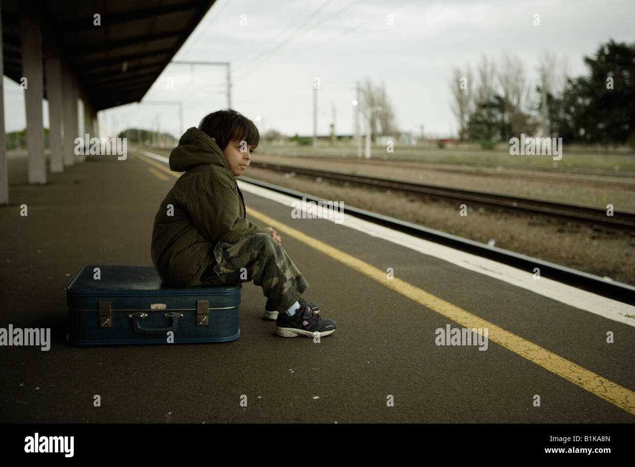 Boy on railway tracks hi-res stock photography and images - Alamy