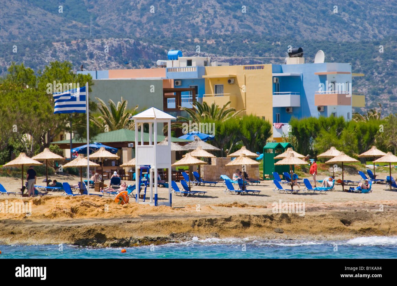 Crete beach. Beach scene at Malia on the Greek Mediterranean island of ...