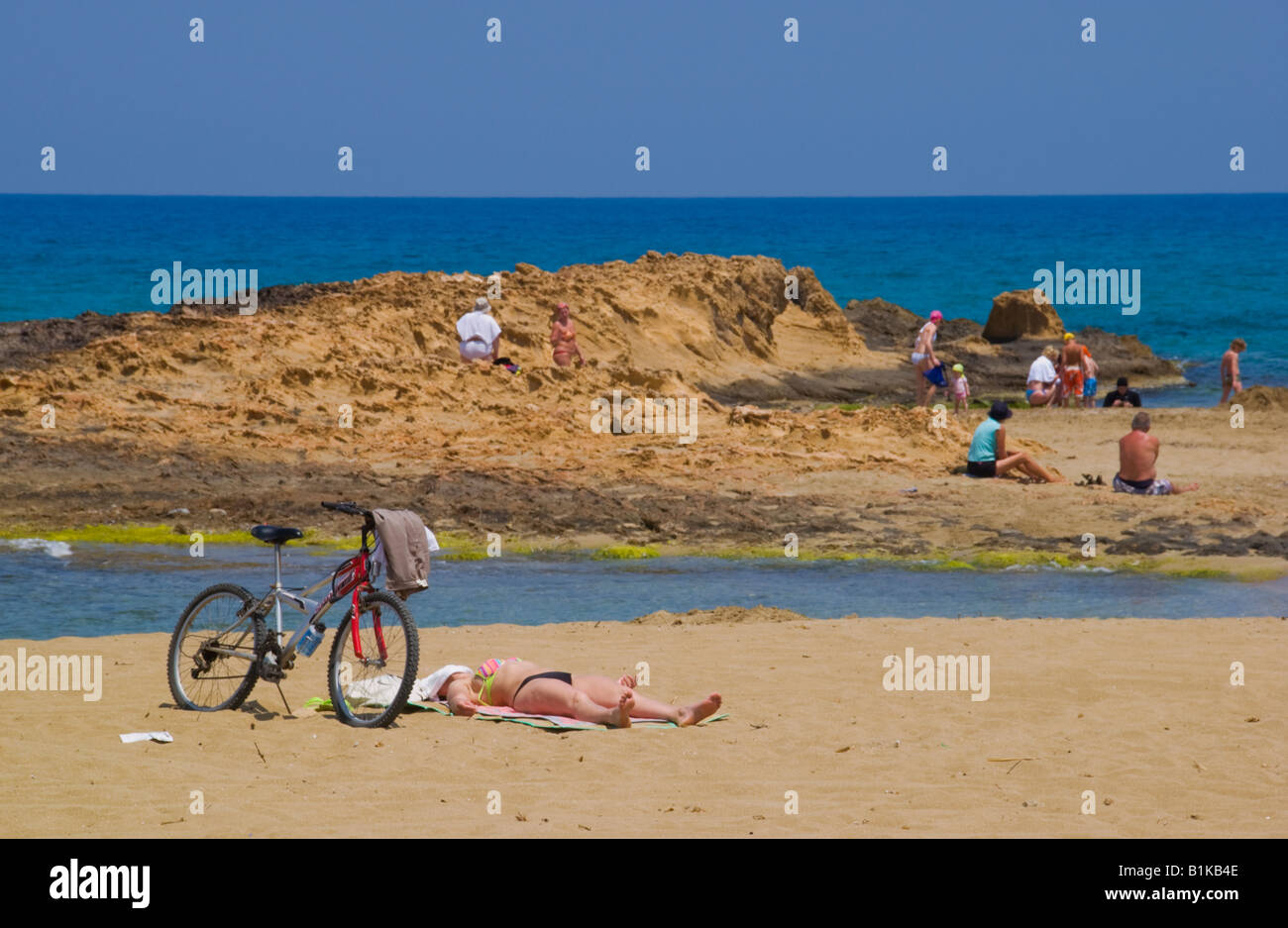 Crete beach holiday Beach scene at Malia on the Greek Mediterranean ...