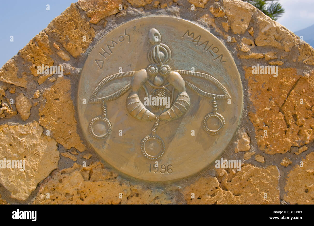 Ancient bee symbol outside traditional church at Malia on the Greek ...