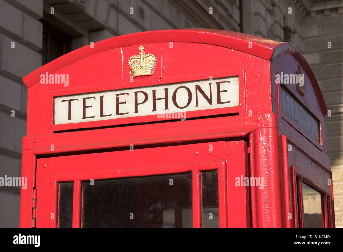 A traditional red English telephone box Stock Photo - Alamy
