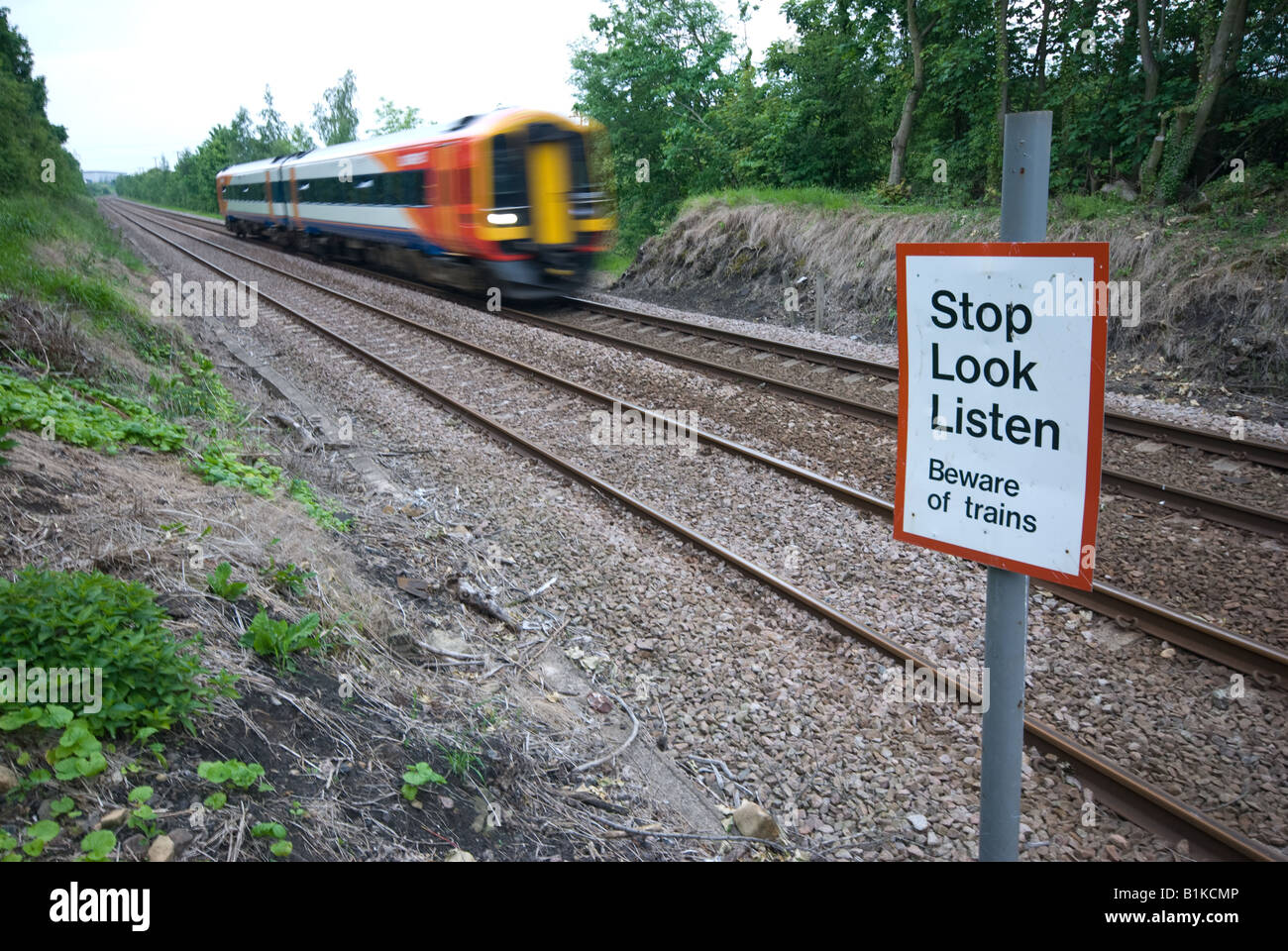 Stop, Look & Listen Train coming Stock Photo - Alamy
